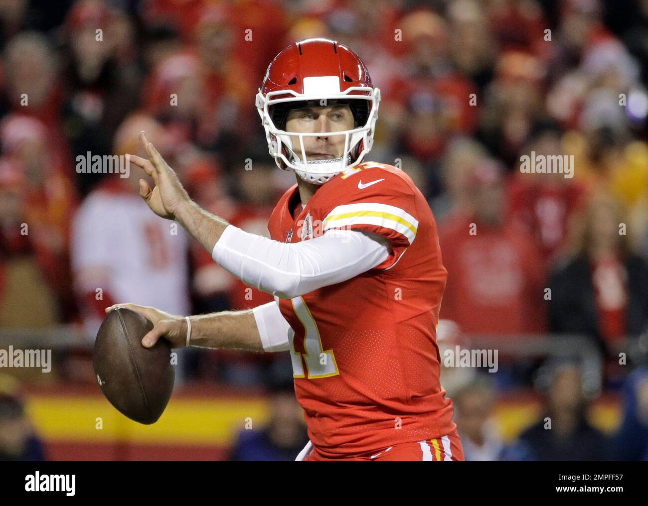 Kansas City Chiefs quarterback Alex Smith (11) looks for a receiver ...