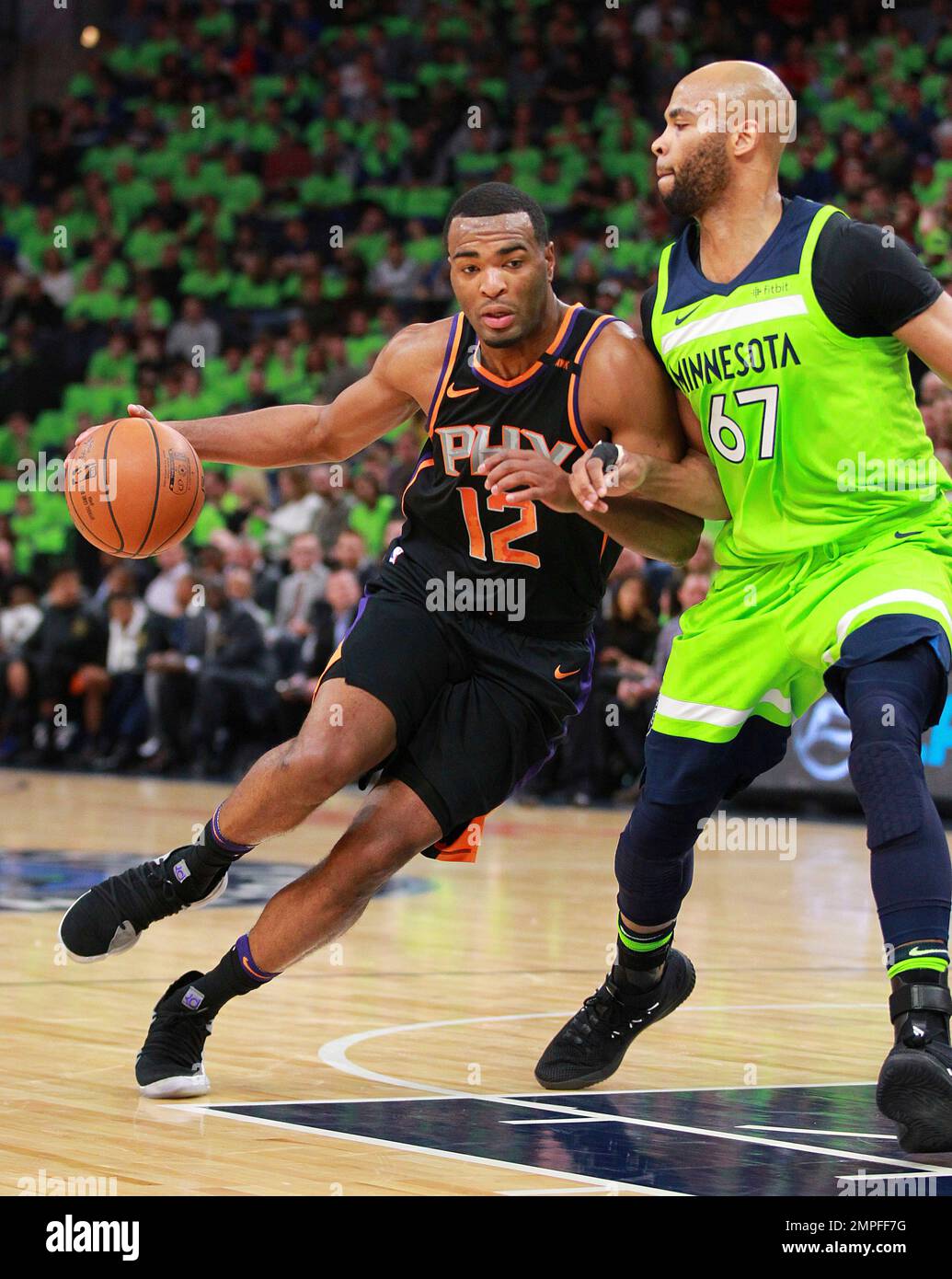 Phoenix Suns forward T.J. Warren (12) drives against Minnesota ...