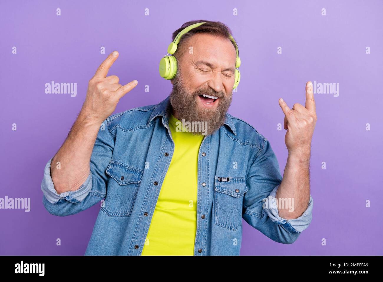 Photo of overjoyed careless aged man closed eyes listen music fingers ...