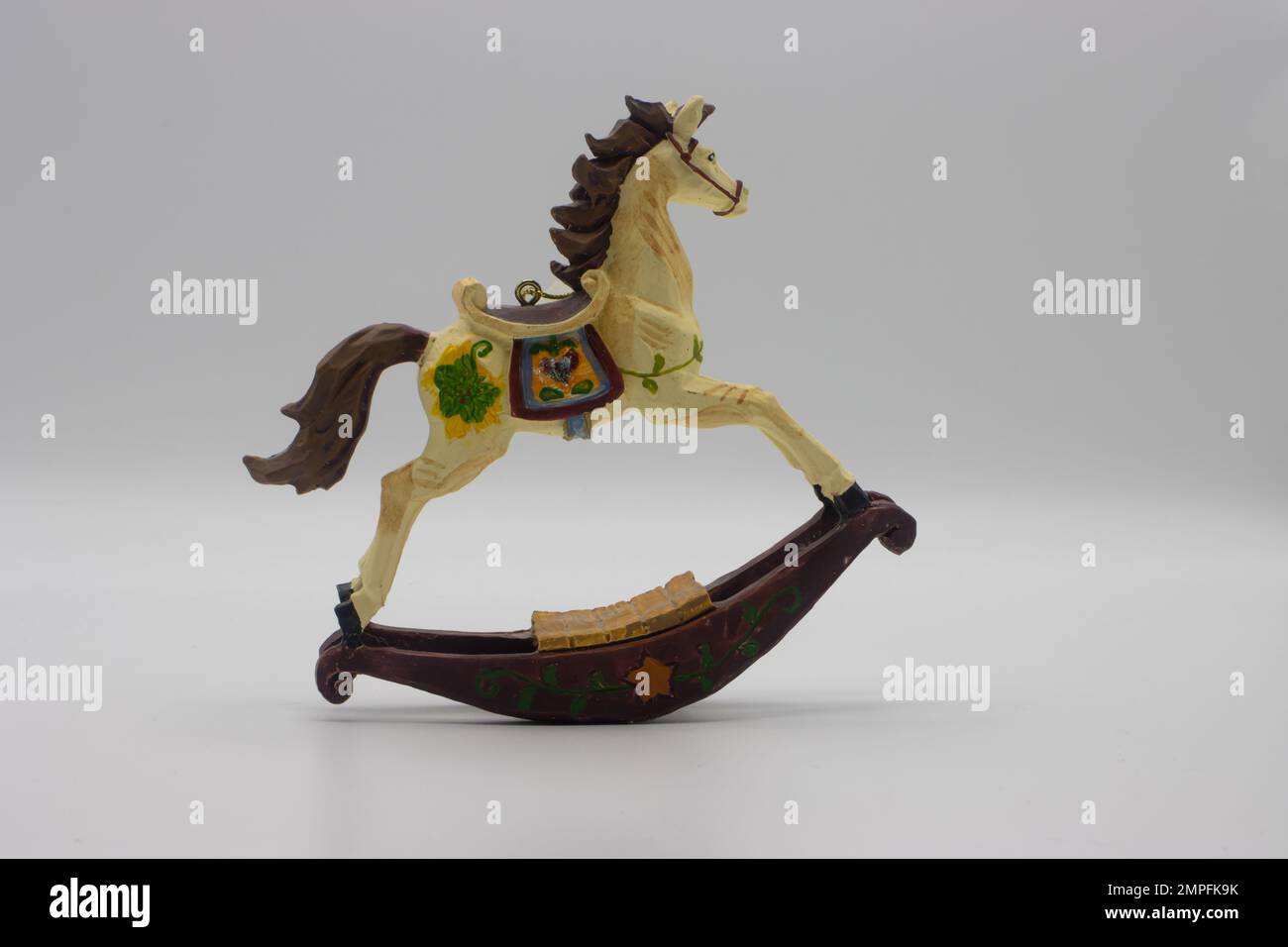 Miniature rocking horse figurine toy on a white background Stock Photo ...