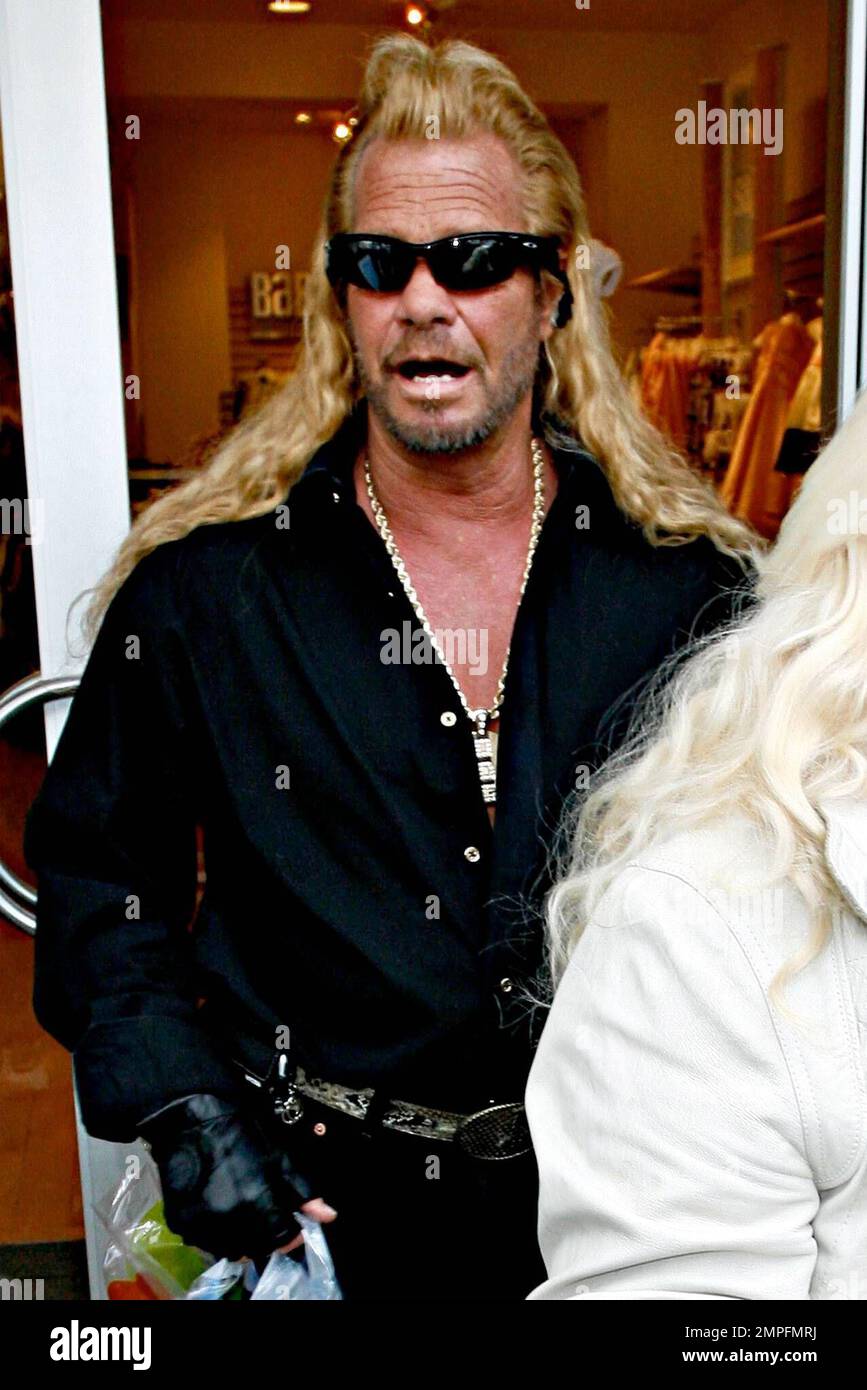 Television bounty hunter Duane "Dog" Chapman and his wife, Beth, shop ...