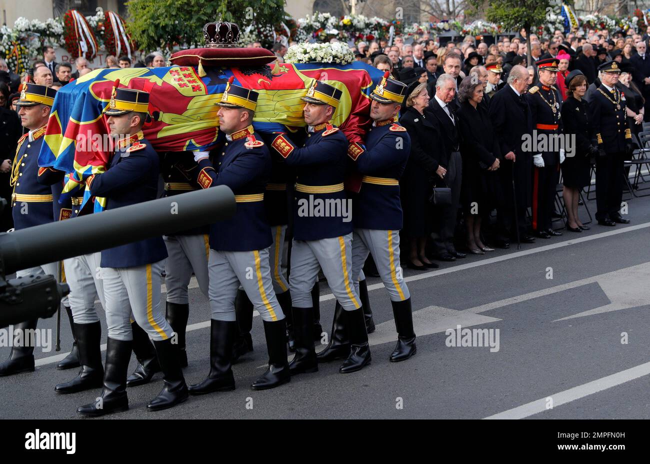 Honor guard soldiers carry the coffin of the late Romanian King Michael ...