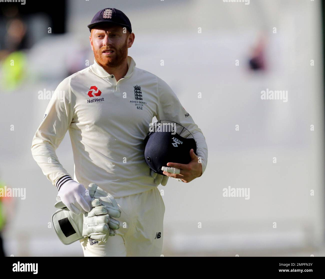 England wicketkeeper Jonny Bairstow leaves the ground at stumps on the ...