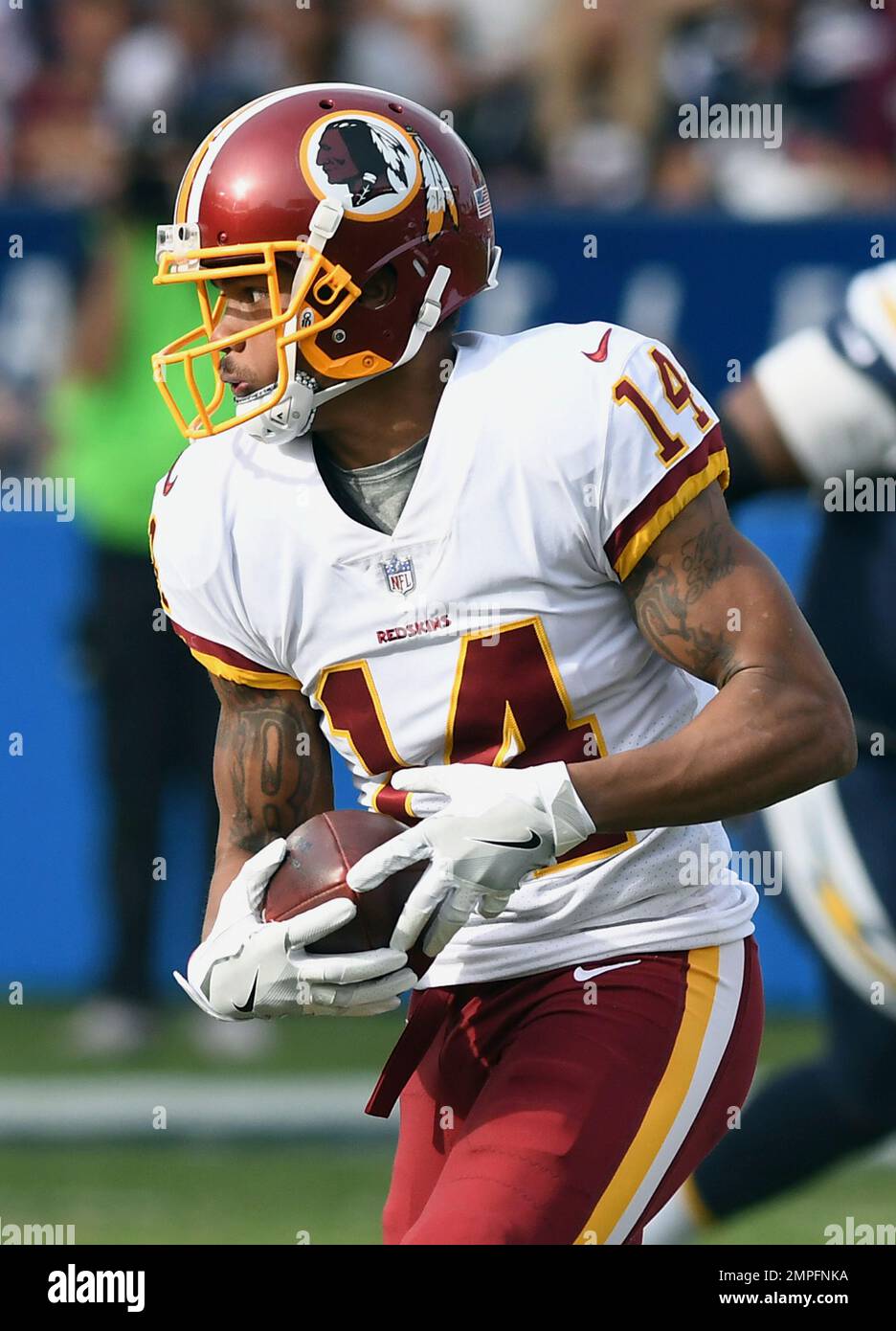 Washington Redskins wide receiver Ryan Grant (14) gains yards after ...