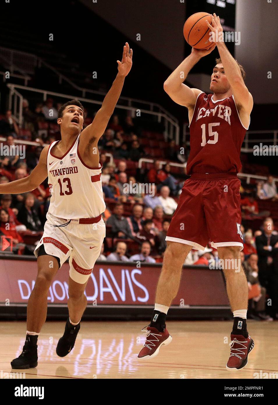 Denver's Thomas Neff, right, shoots against Stanford's Oscar da Silva ...