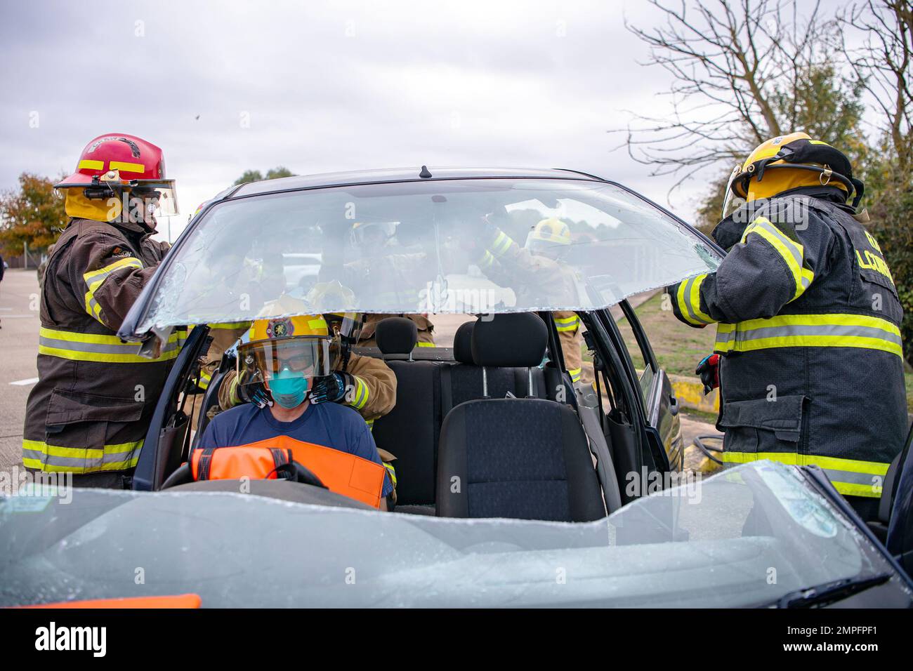 Firefighters from the 423d Civil Engineer Squadron, lift the upper ...