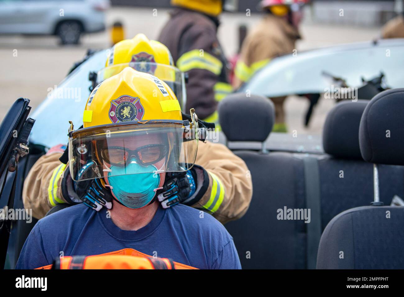 A firefighter from the 423d Civil Engineer Squadron secures a simulated ...