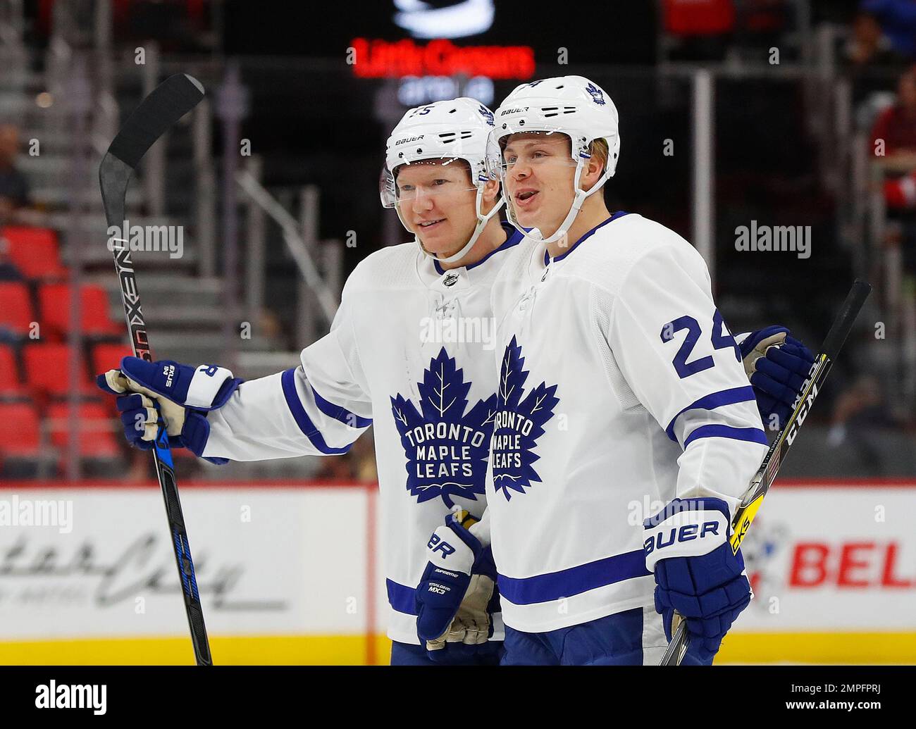 Toronto Maple Leafs defenseman Andreas Borgman, left, celebrates his ...
