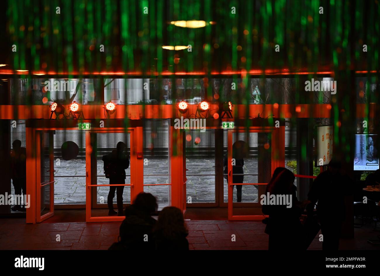 Berlin, Germany. 31st Jan, 2023. Visitors walk past an exhibit at ...