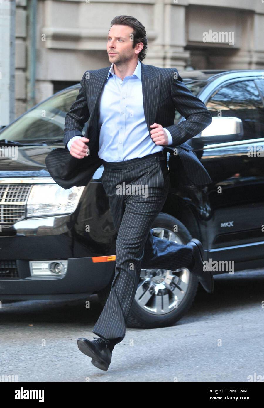 Bradley Cooper looks sharp in his suit while filming the new thriller ...