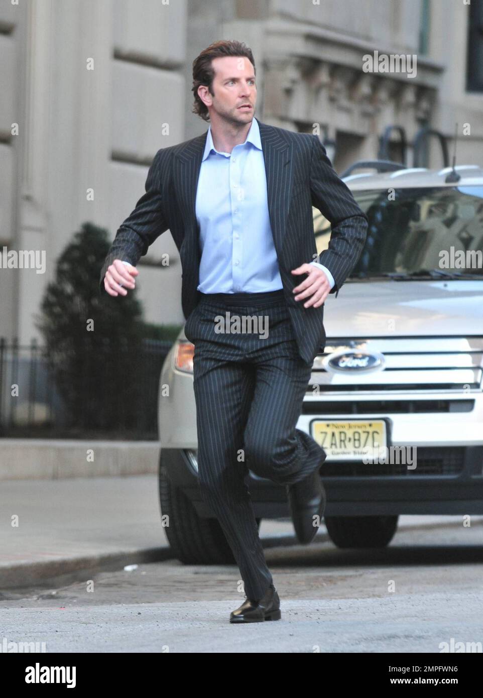 Bradley Cooper looks sharp in his suit while filming the new thriller ...