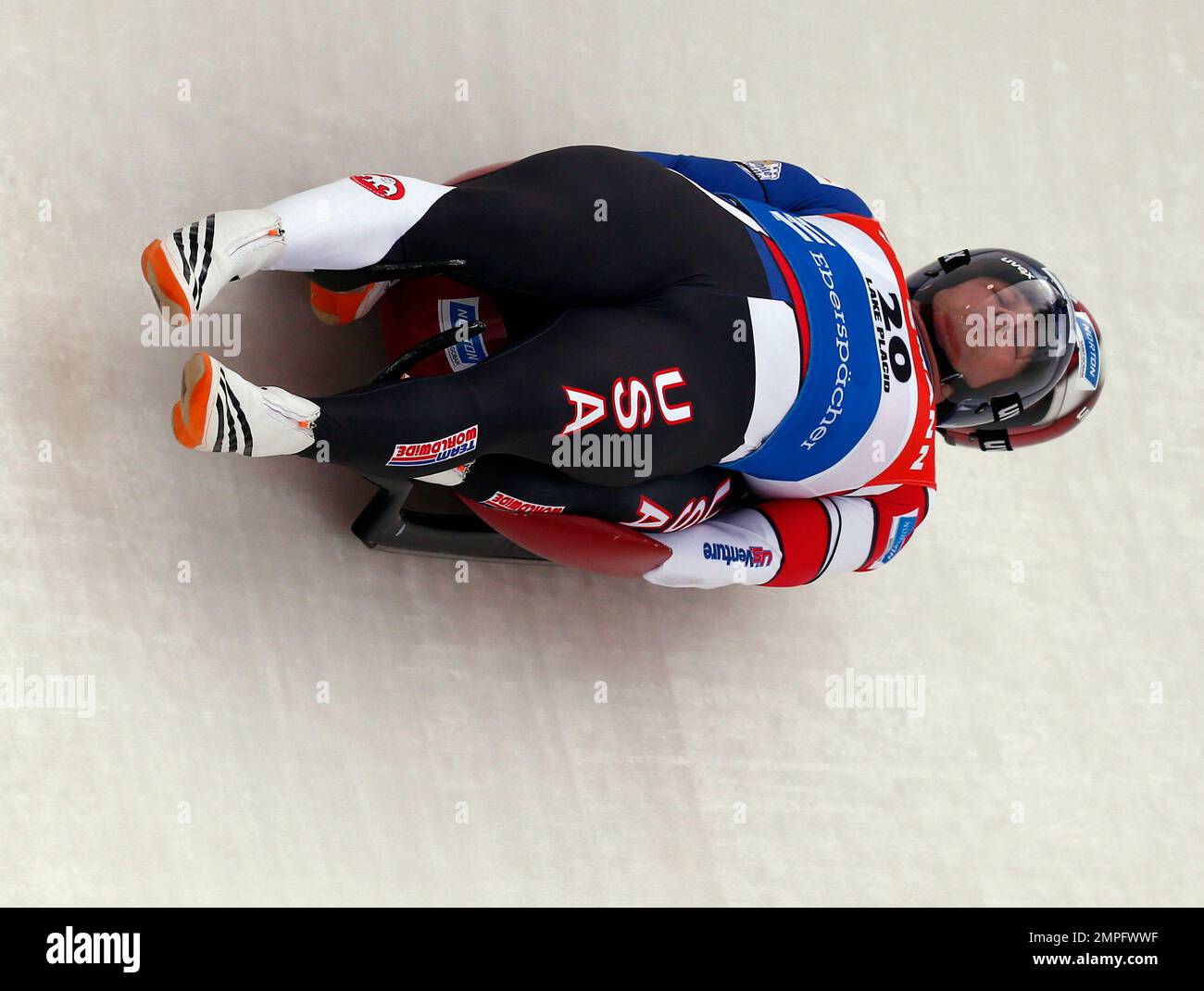 Matt Mortensen, top, and Jayson Terdiman, of the United States, take a ...