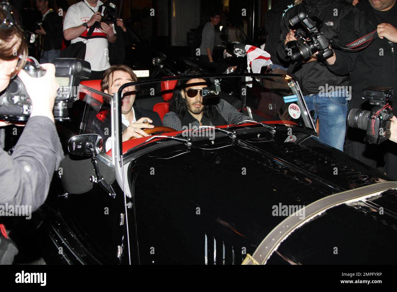 Russel Brand and Johnathan Ross arrive at the Pre Wimbledon Party held ...
