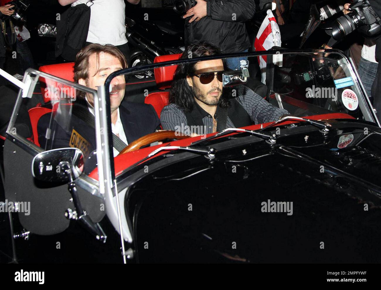 Russel Brand and Johnathan Ross arrive at the Pre Wimbledon Party held ...