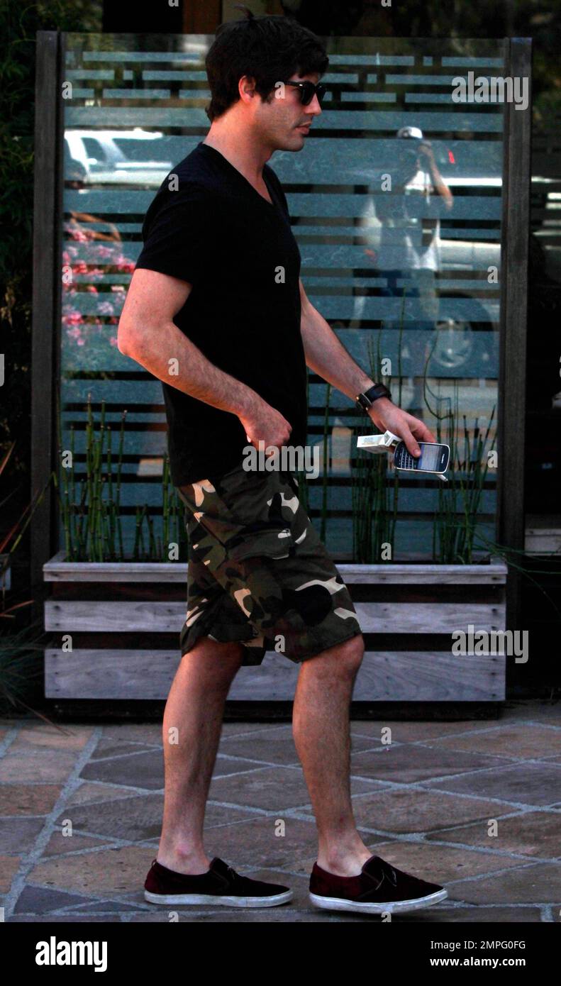 EXCLUSIVE!! Oil heir Brandon Davis was spotted taking a cigarette break ...