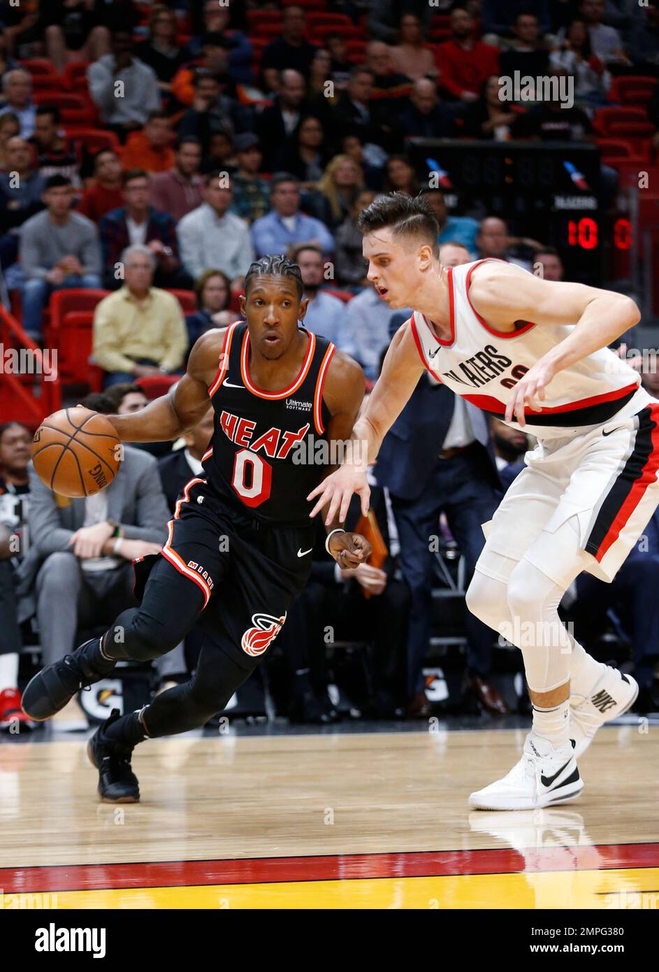 Miami Heat guard Josh Richardson (0) drives past Portland Trail Blazers ...