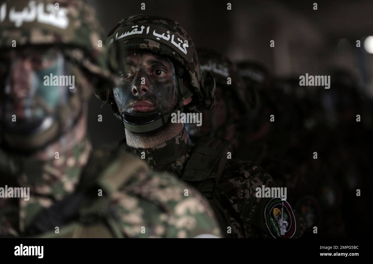 Palestinian members of the Qassam brigades, the militia wing of Hamas ...