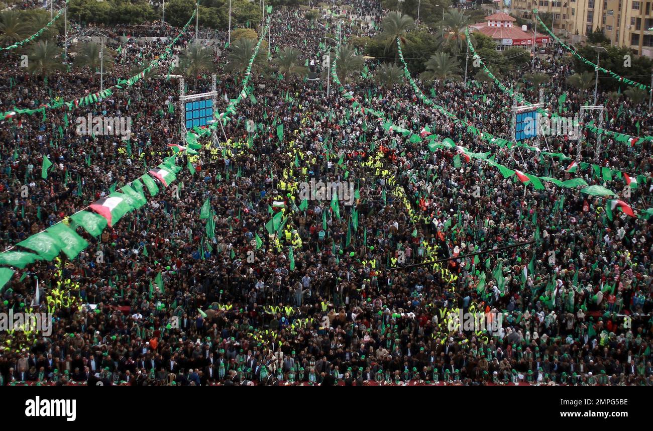 Palestinian Hamas supporters attend a Rally marking the 30th ...