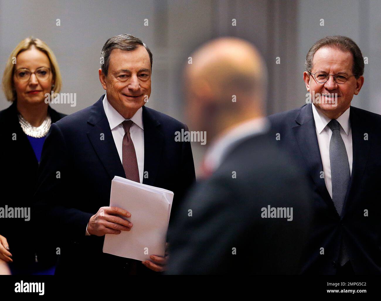 President of the European Central Bank Mario Draghi , 2nd left, and ...
