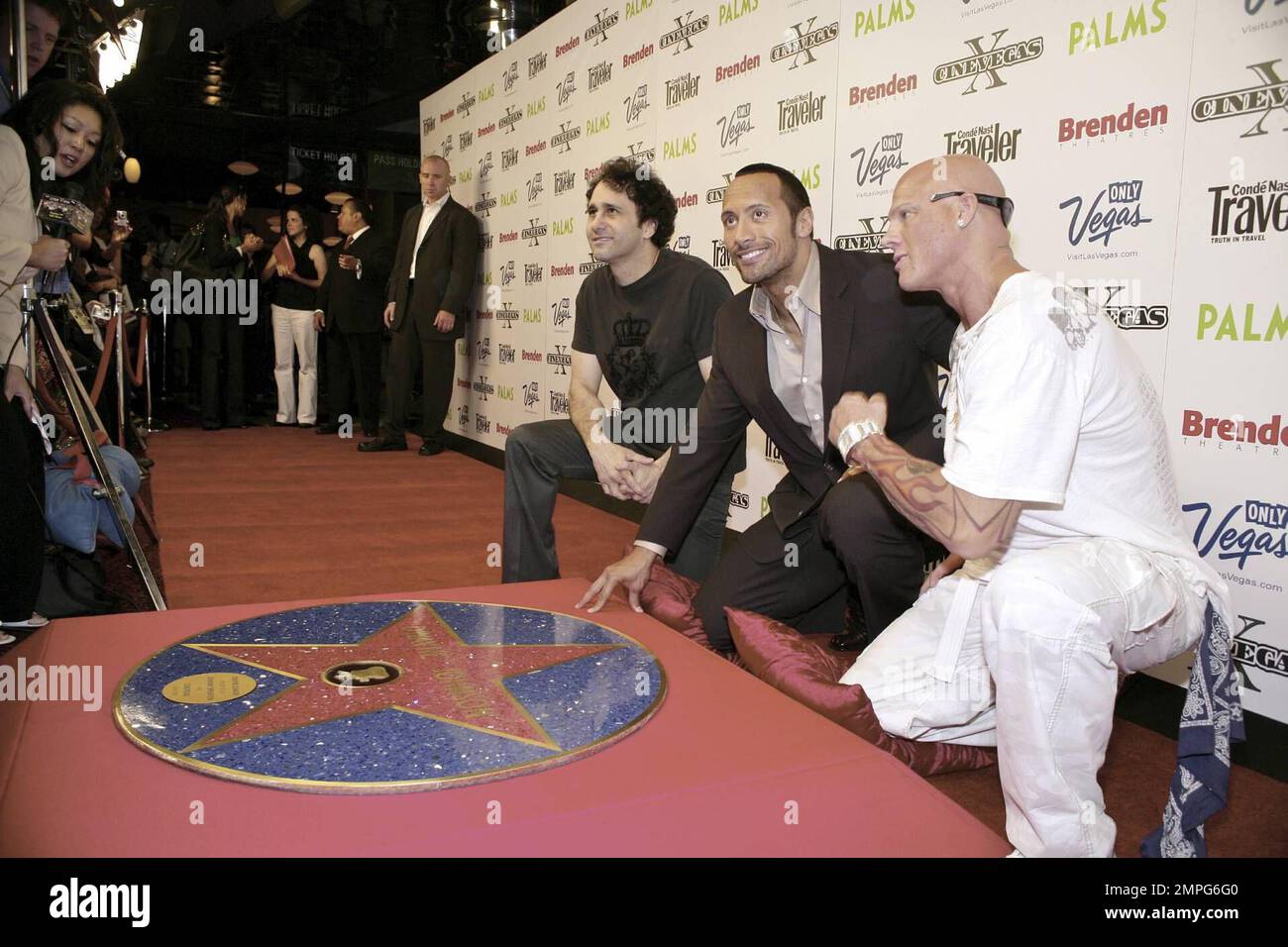 George Maloof, Dwayne Johnson (aka The Rock) and Johnny Brenden attend ...