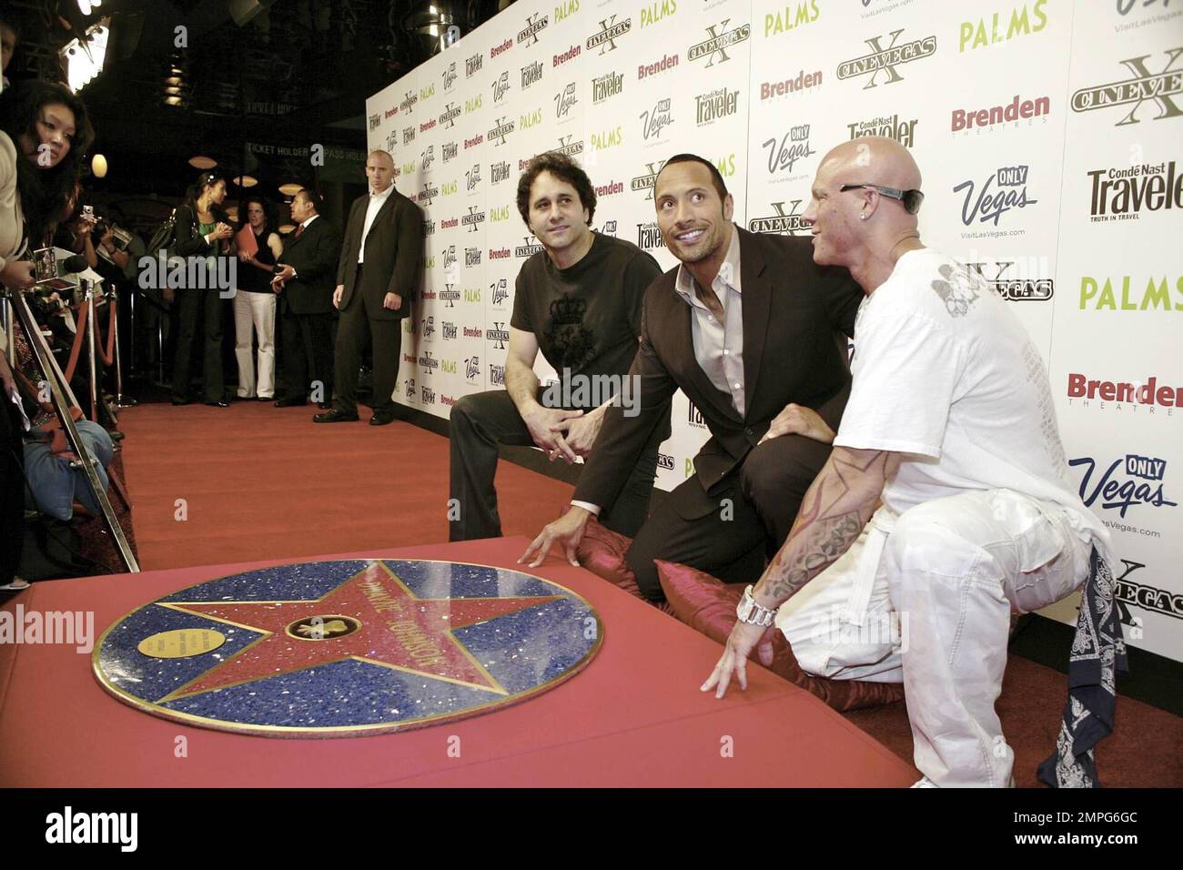 George Maloof, Dwayne Johnson (aka The Rock) and Johnny Brenden attend ...