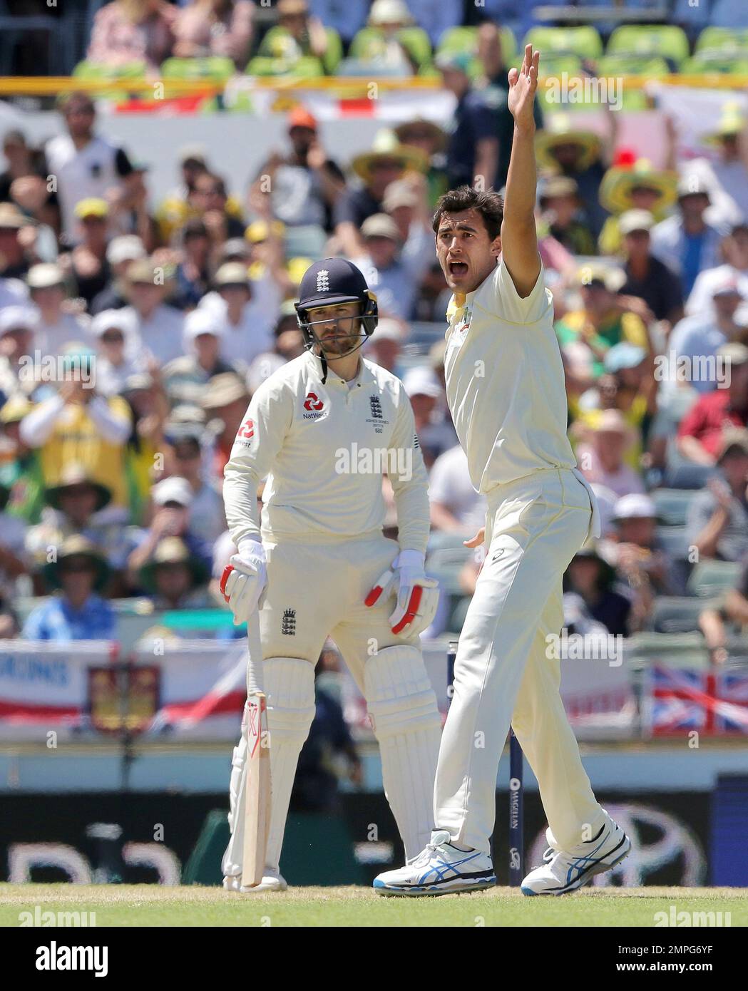 Australia's Mitchell Starc, right, appeals for the wicket of England's ...