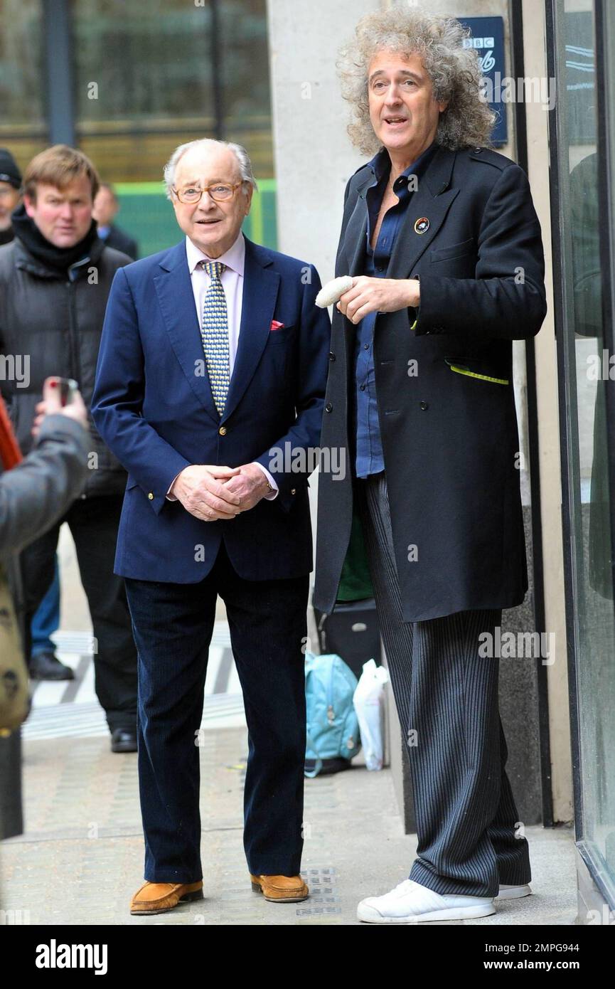 Actor and broadcaster David Jacobs CBE and Queen's Brian May pose for ...