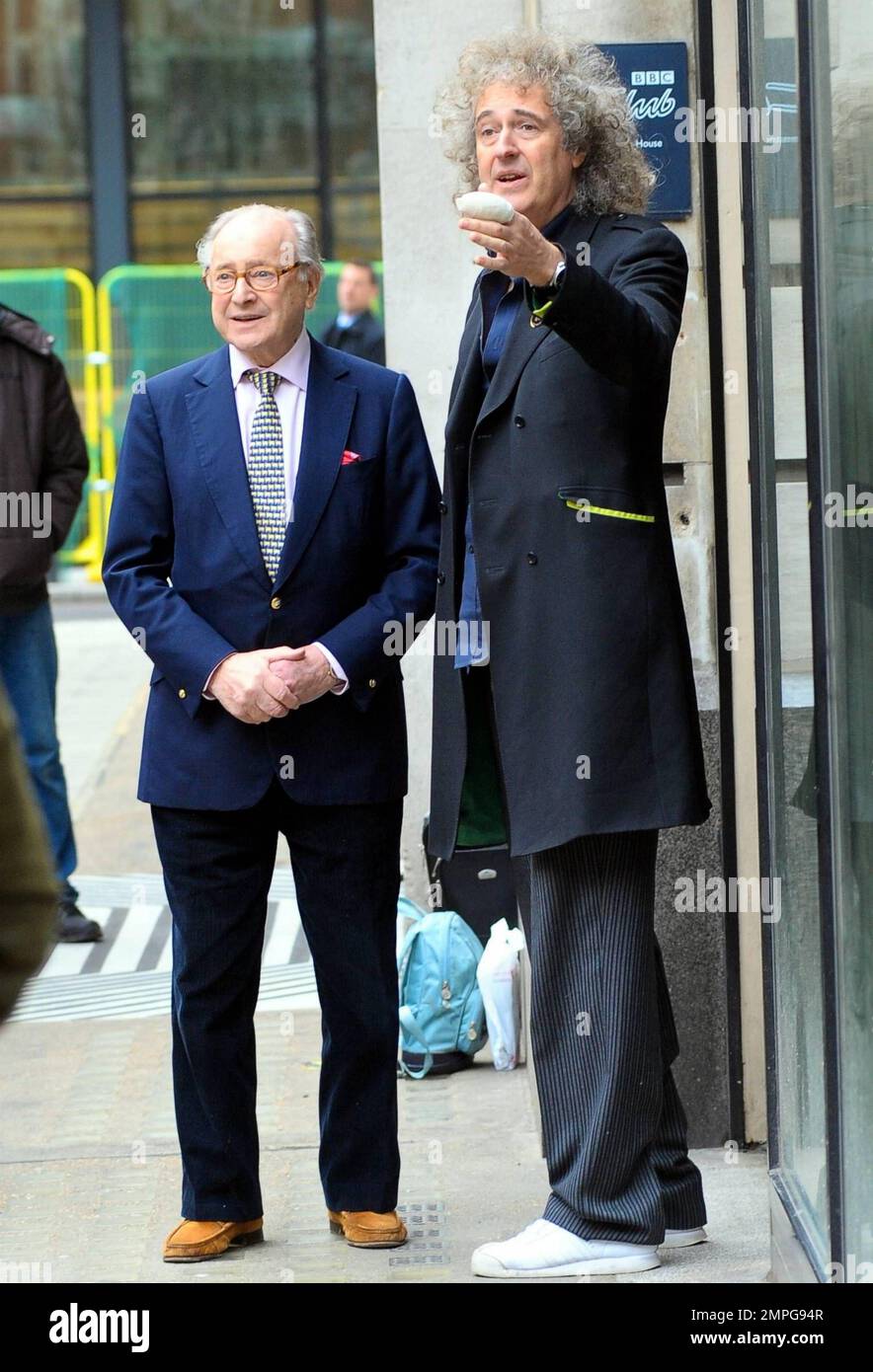 Actor and broadcaster David Jacobs CBE and Queen's Brian May pose for ...