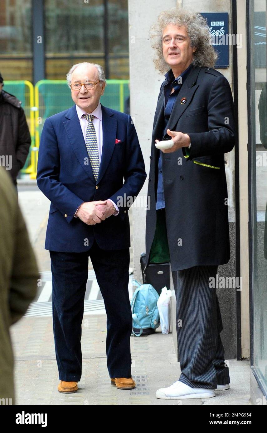 Actor and broadcaster David Jacobs CBE and Queen's Brian May pose for ...