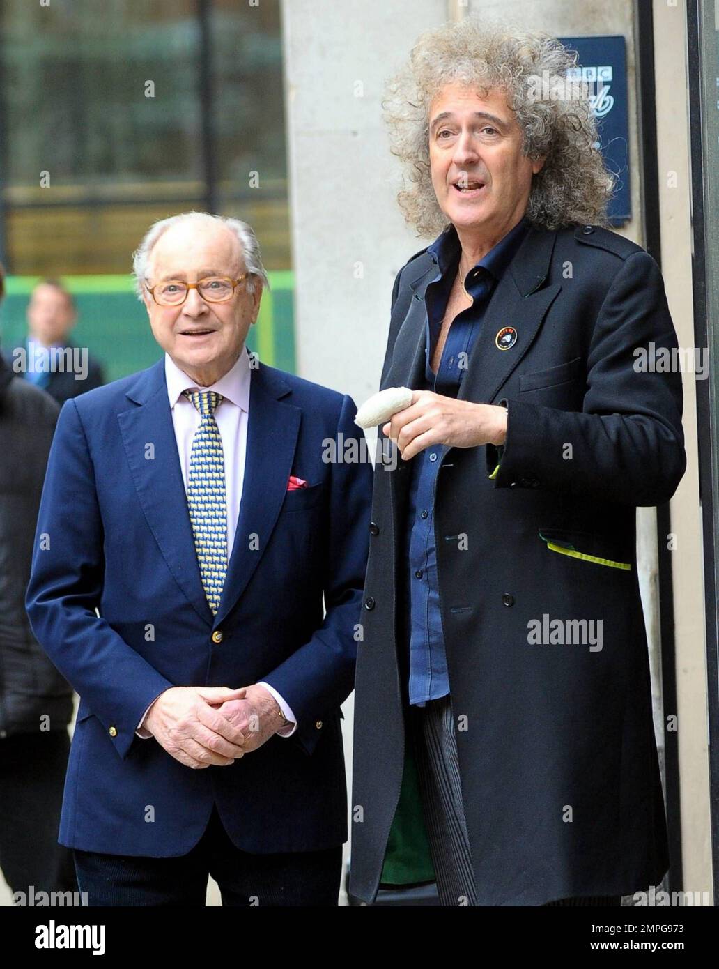 Actor and broadcaster David Jacobs CBE and Queen's Brian May pose for ...