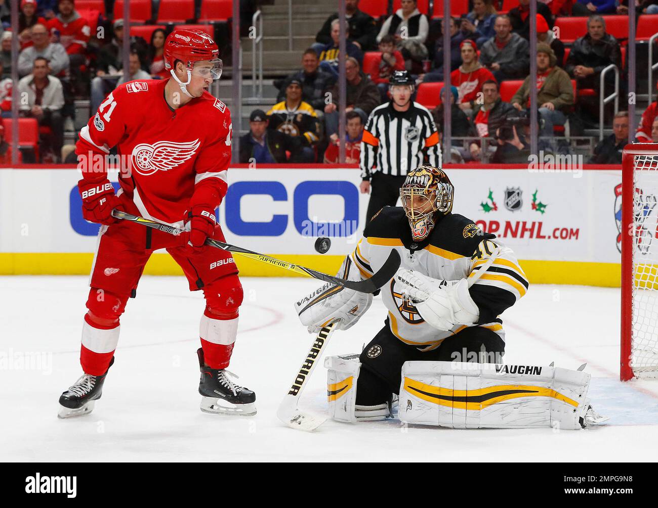 Detroit Red Wings center Dylan Larkin (71) tries to deflect a shot on ...