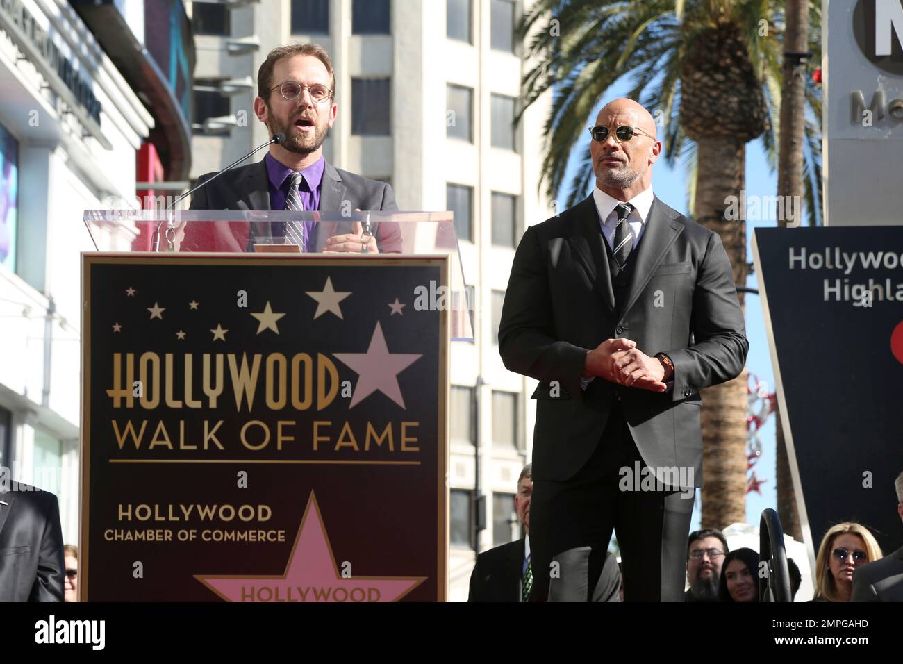 Mitch O'Farrell, left, and Dwayne Johnson speak at his star ceremony at ...