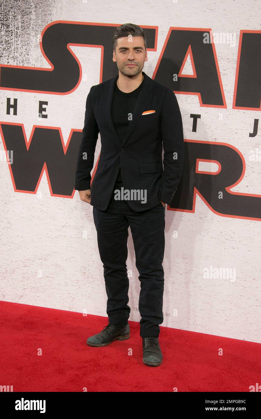 Oscar Isaac poses for photographers upon arrival at the premiere of the ...