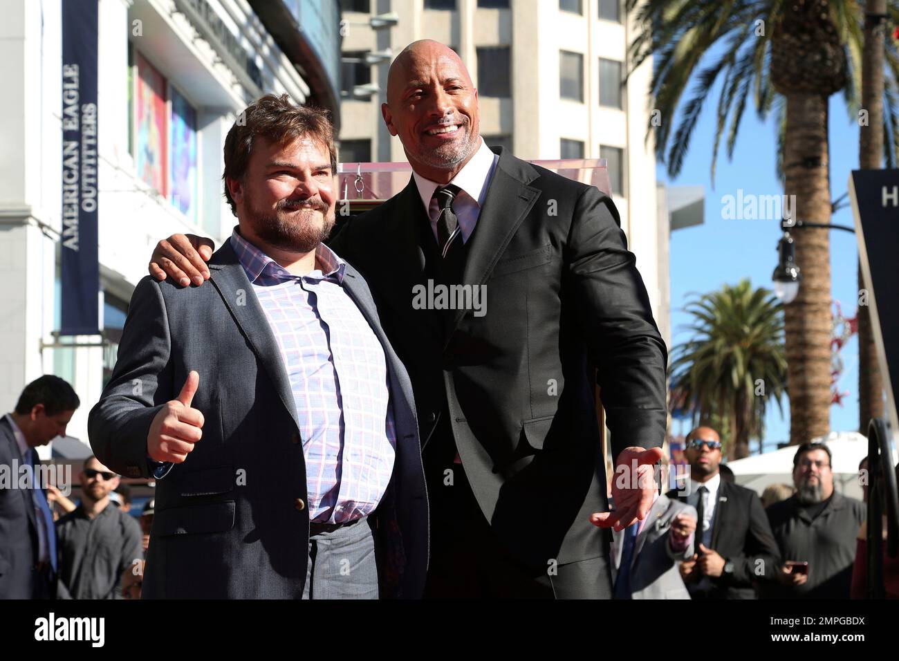 Jack Black, left, and Dwayne Johnson pose for a photo at a ceremony ...