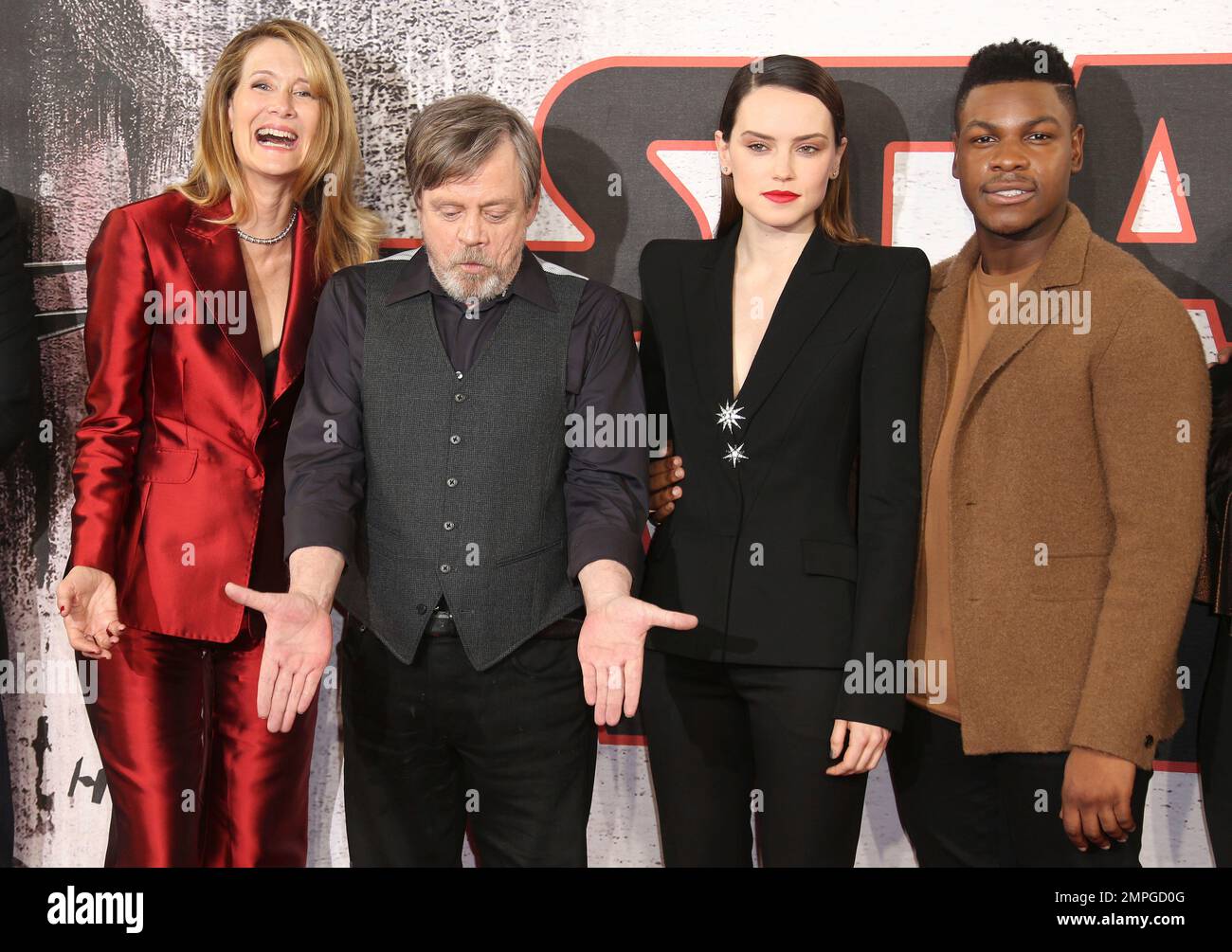 Actors Laura Dern, from left, Mark Hamill, Daisy Ridley and John Boyega ...