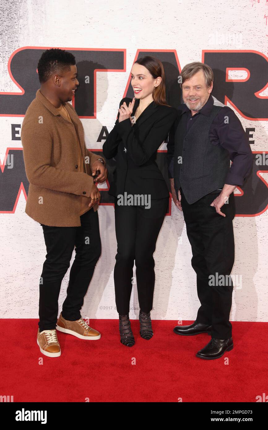 John Boyega, Daisy Ridley and Mark Hamill pose for photographers with ...