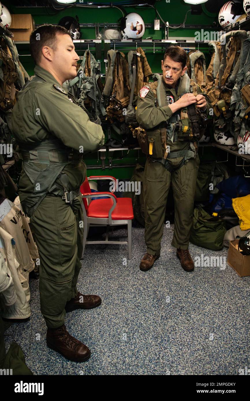 Rear Adm. Greg Huffman, right, commander, Carrier Strike Group (CSG) 12 ...