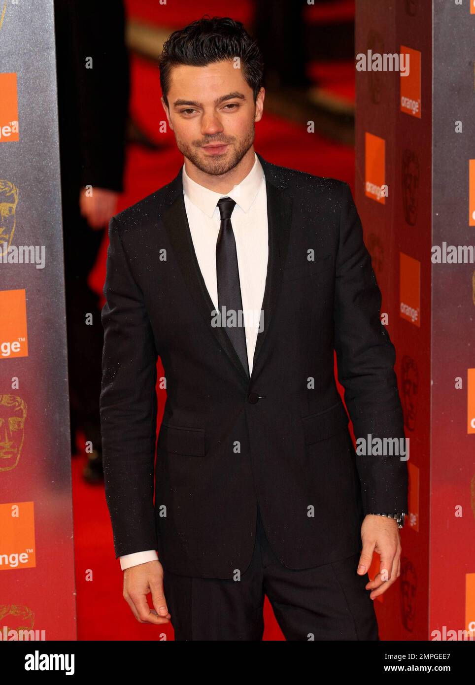 Dominic Cooper poses for photographers on the red carpet at the 2011 ...