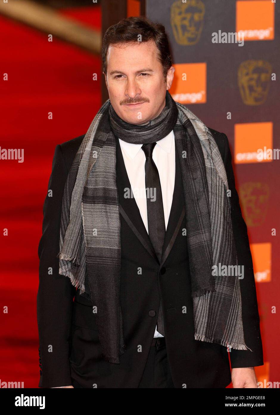 Darren Aronofsky poses for photographers on the red carpet at the 2011 ...