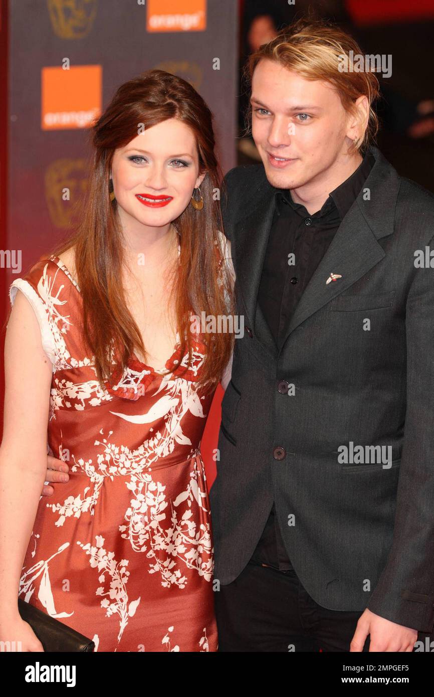 Bonnie Wright and Jamie Campbell Bower pose for photographers on the ...