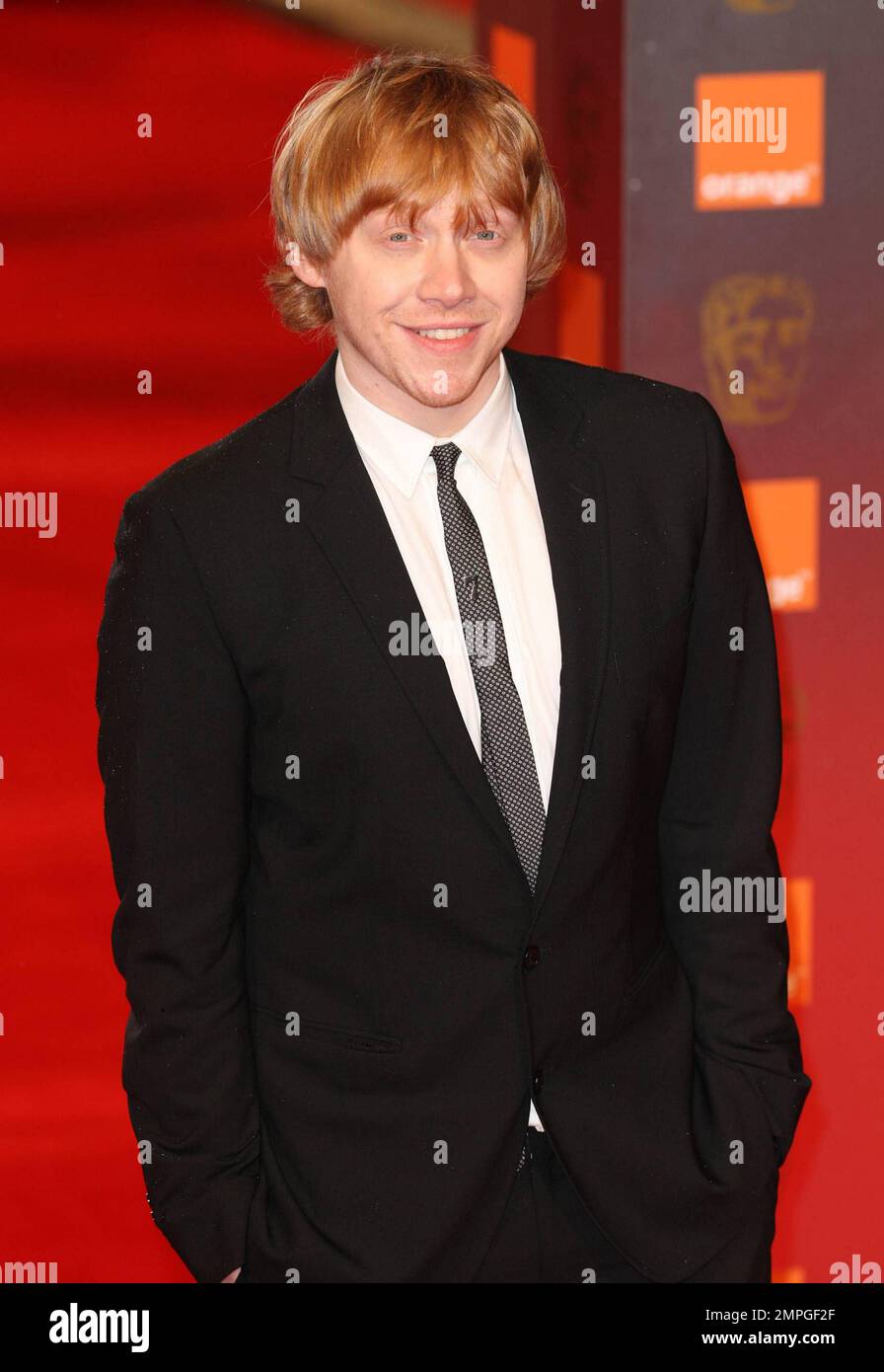 Rupert Grint poses for photographers on the red carpet at the 2011ange ...