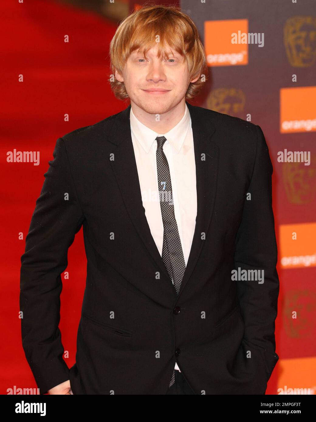 Rupert Grint poses for photographers on the red carpet at the 2011ange ...