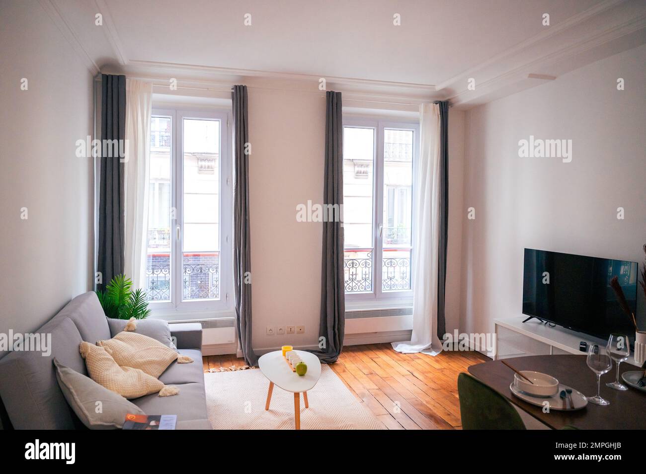 An interior design of a cozy modern living room Stock Photo - Alamy