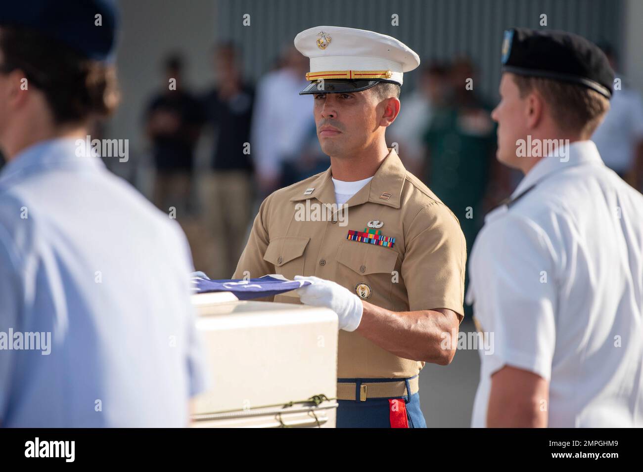 U.S. Marine Corps Capt. Jon Tamanah, a team leader assigned to the ...