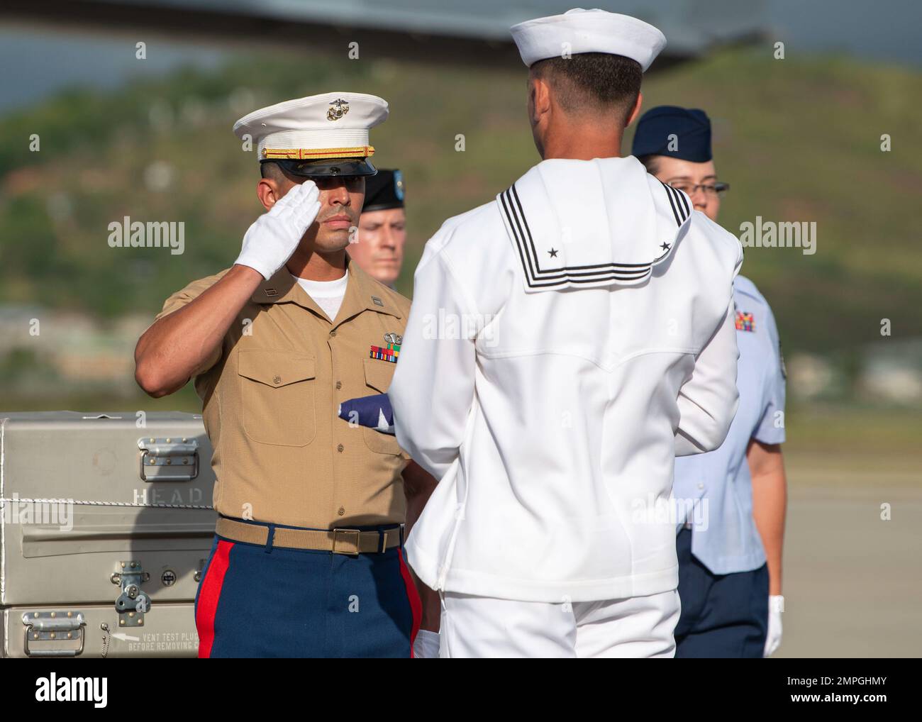 U.S. Marine Corps Capt. Jon Tamanah, a team leader assigned to the ...