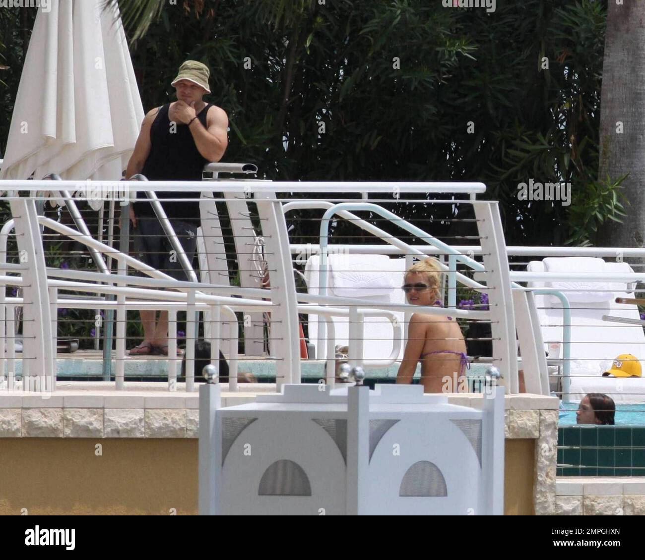 Britney Spears spends the day with her family by the pool. Britney's ...