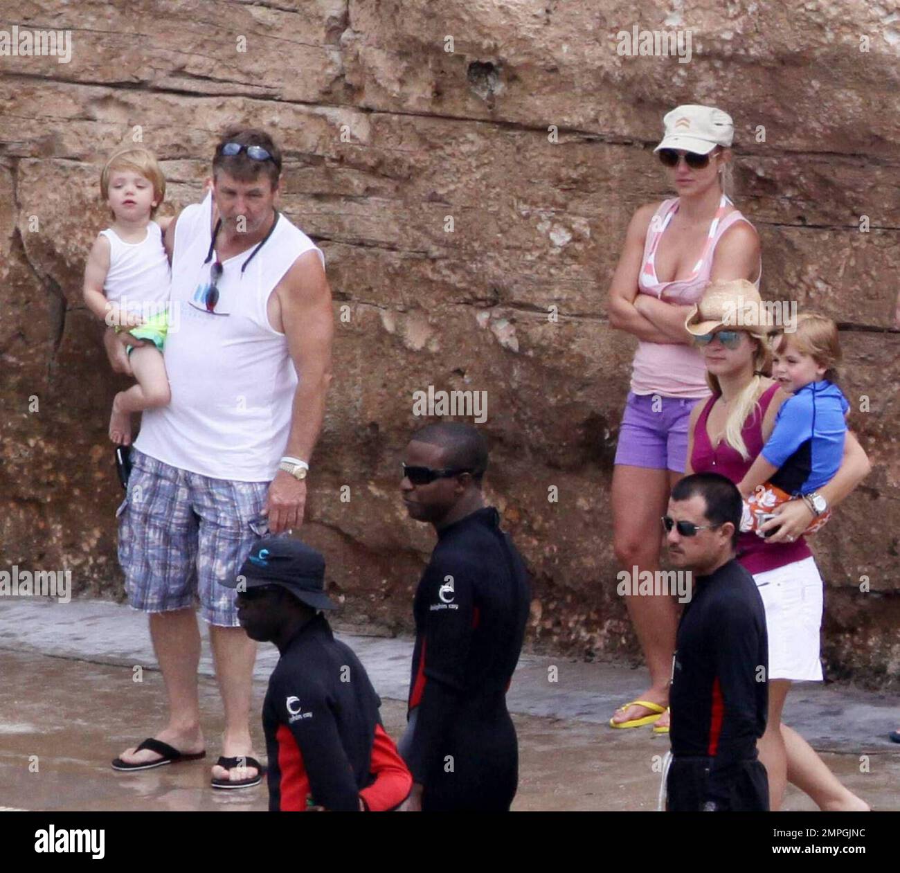 Exclusive!! Popstar Britney Spears feeds the dolphins fish and takes ...