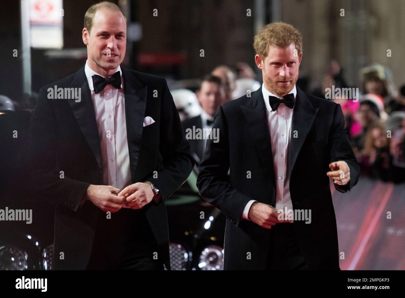 Britain's Prince William, left, and Prince Harry arrive at the premiere ...