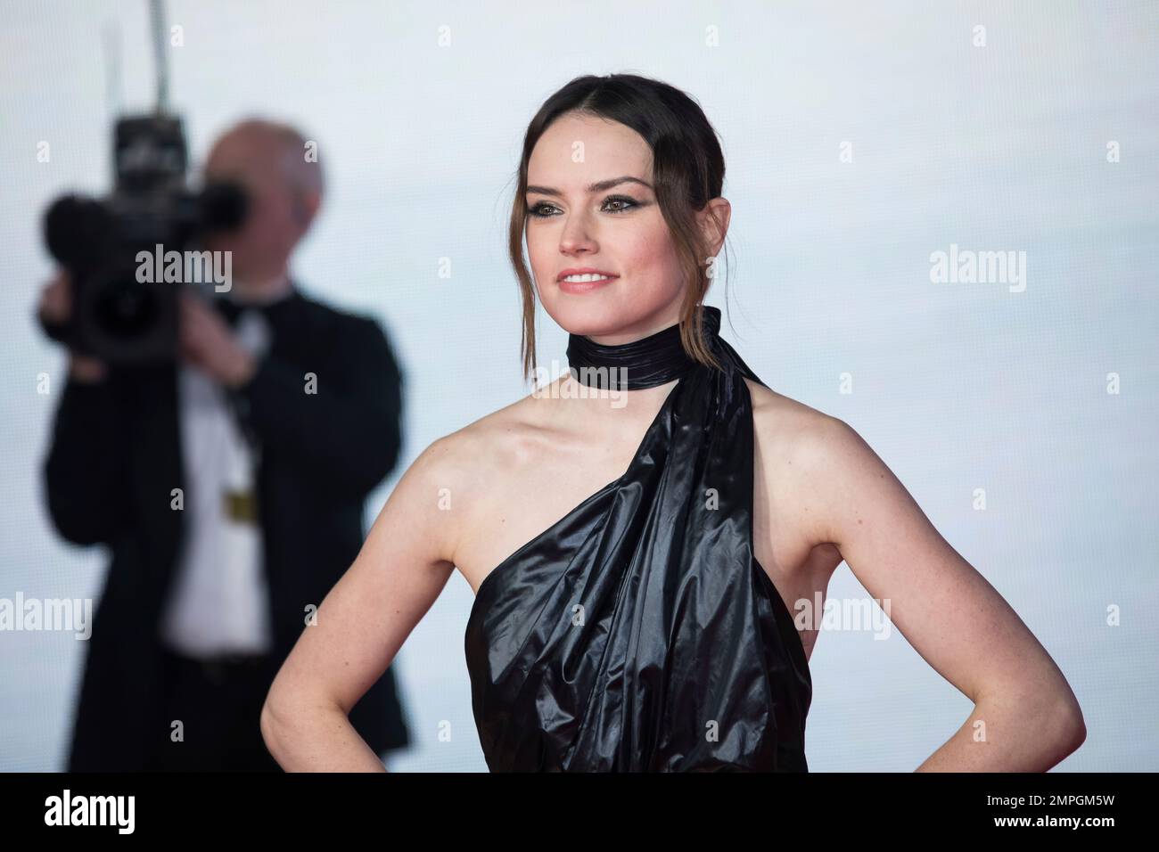 Daisy Ridley poses for photographers upon arrival at the premiere of ...