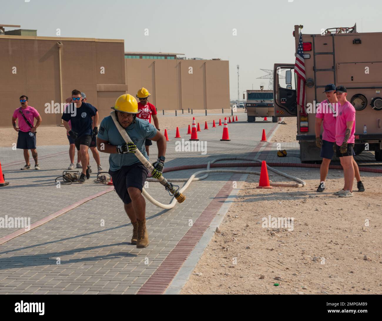 .S. Air Force firefighters assigned to the 379th Expeditionary Civil ...